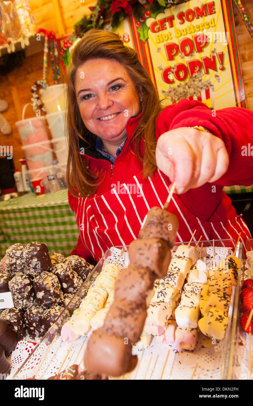 London December 7th 2013. A stallholder offers chocolate mashmallows at ...