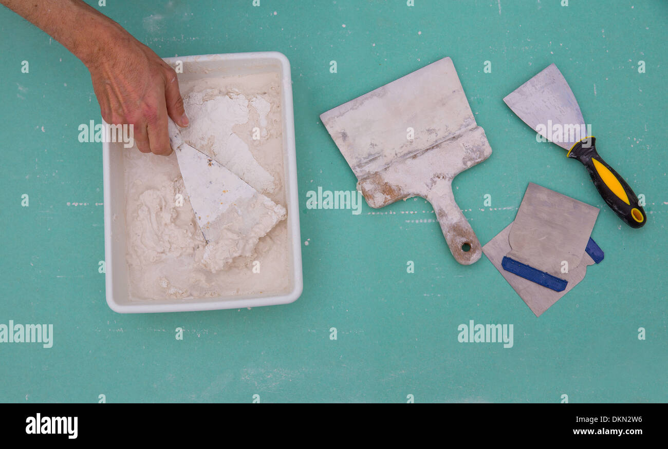 Platering tools for plaster like plaste trowel spatula on green drywall ...