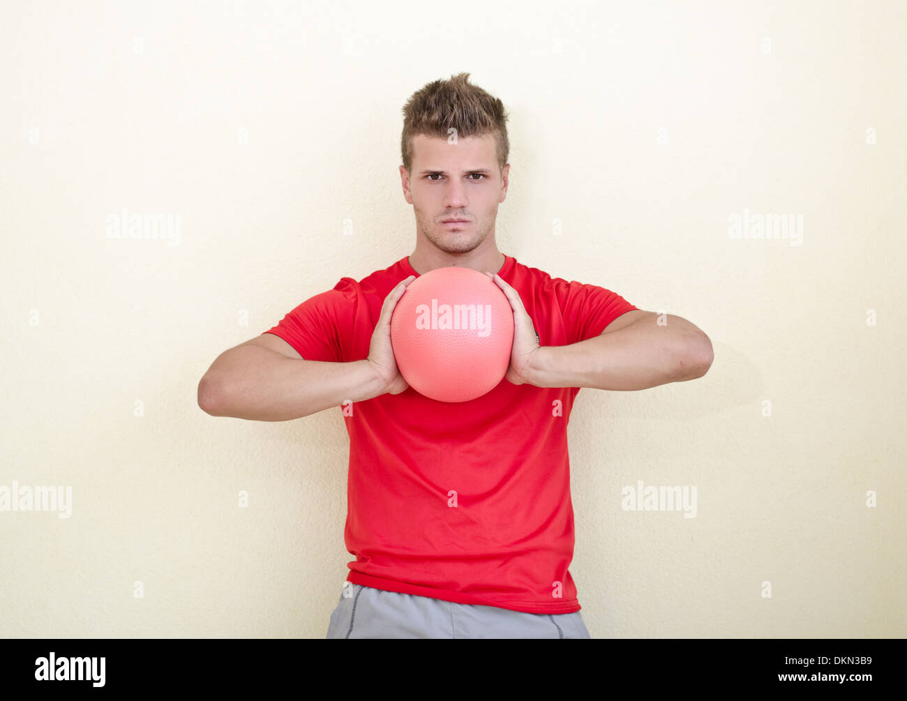 Man holding ball hands hi-res stock photography and images - Alamy