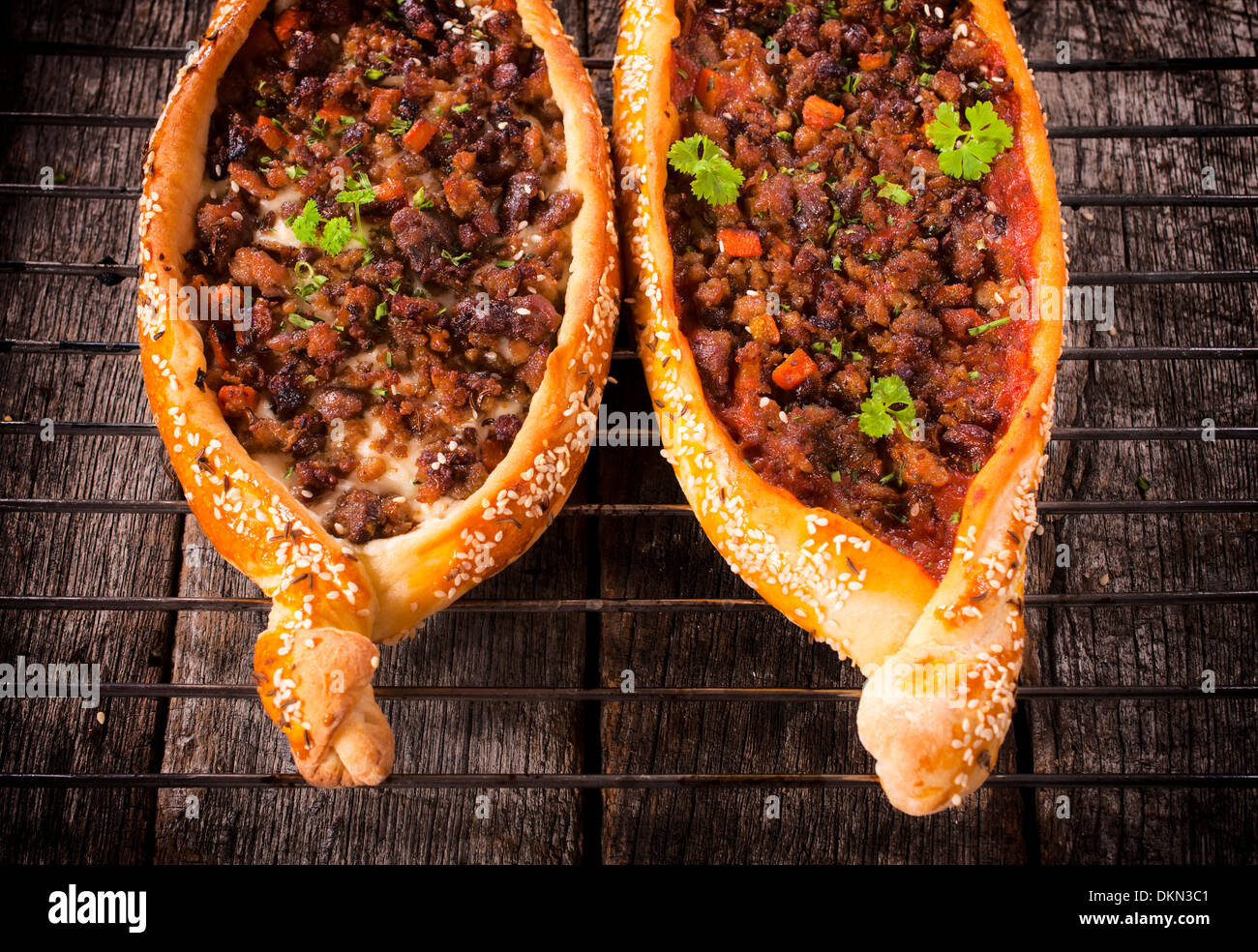 Traditional Turkish pide with beef meat and sauces Stock Photo - Alamy