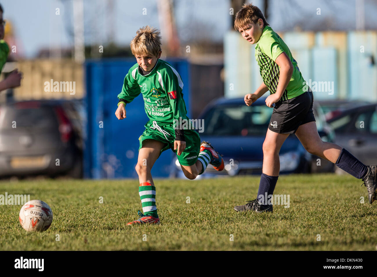 Primary school aged boys playing competitive football soccer in the ...