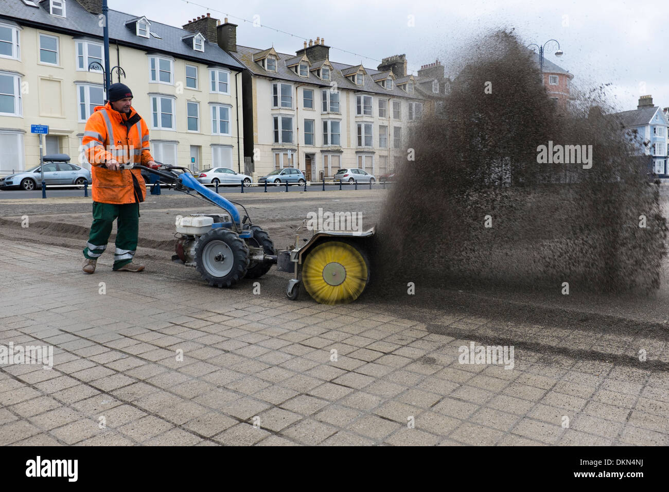 Sweeping up sand hi-res stock photography and images - Alamy