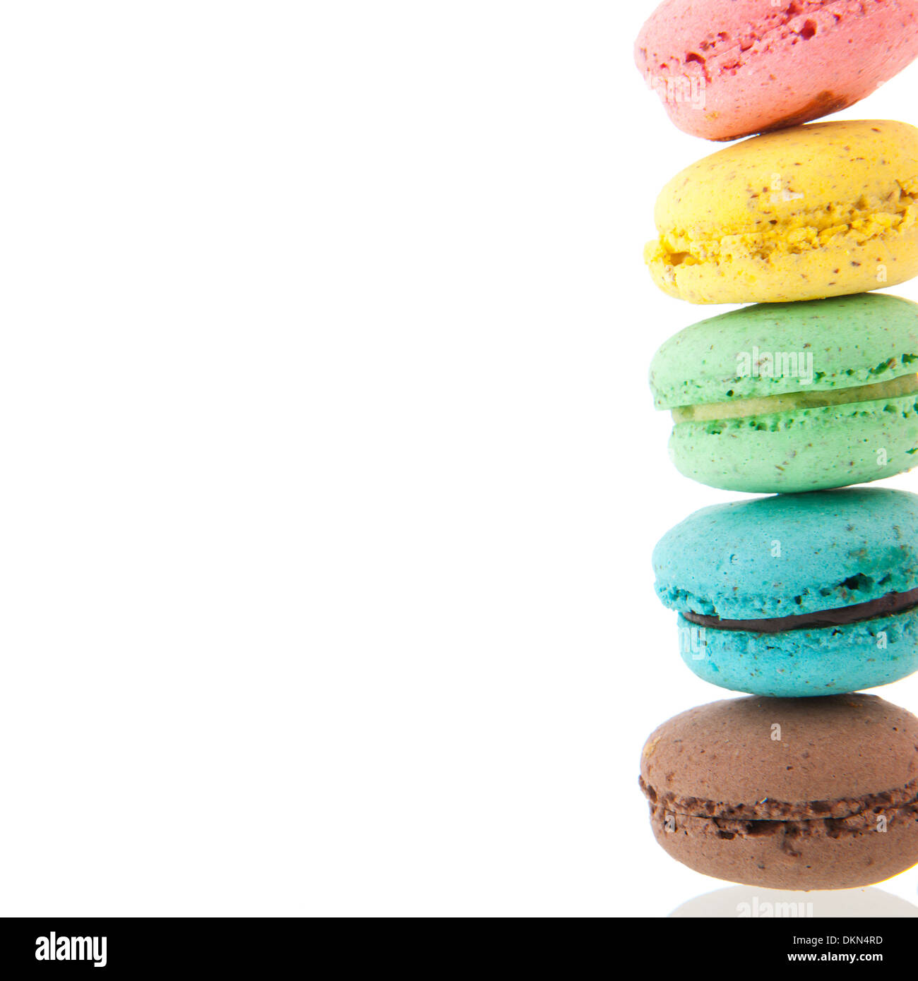 Cadre of stacked colorful macaroons isolated white background Stock ...