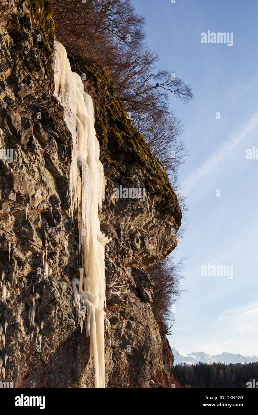 Frozen waterfall on a steep cliff off the Chilkat Inlet in Southeast ...