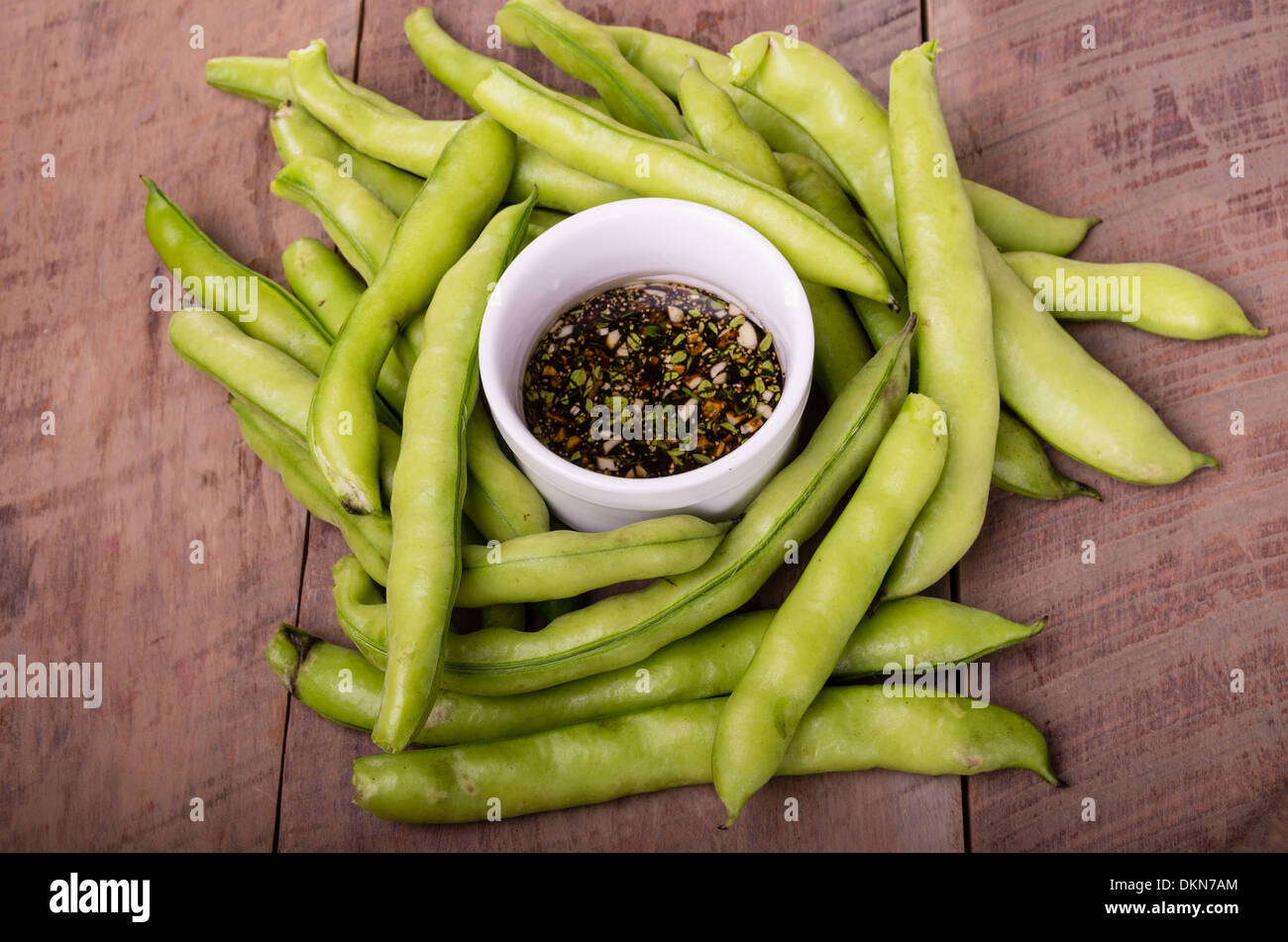 Fresh fava beans with dipping sauce ready to eat Stock Photo - Alamy