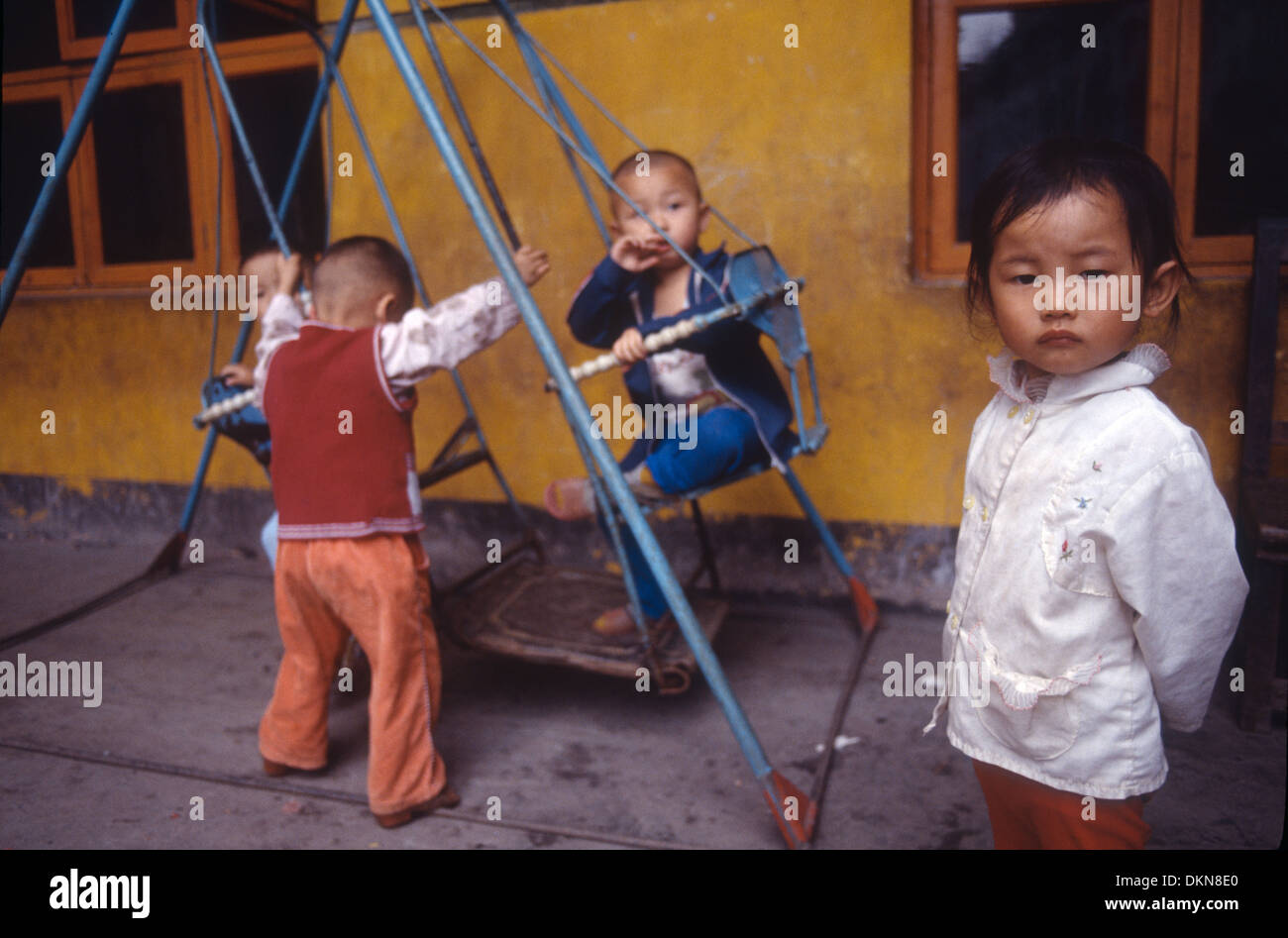 Kids playing after school in a kindergarten in Fenghuang, Hunan ...
