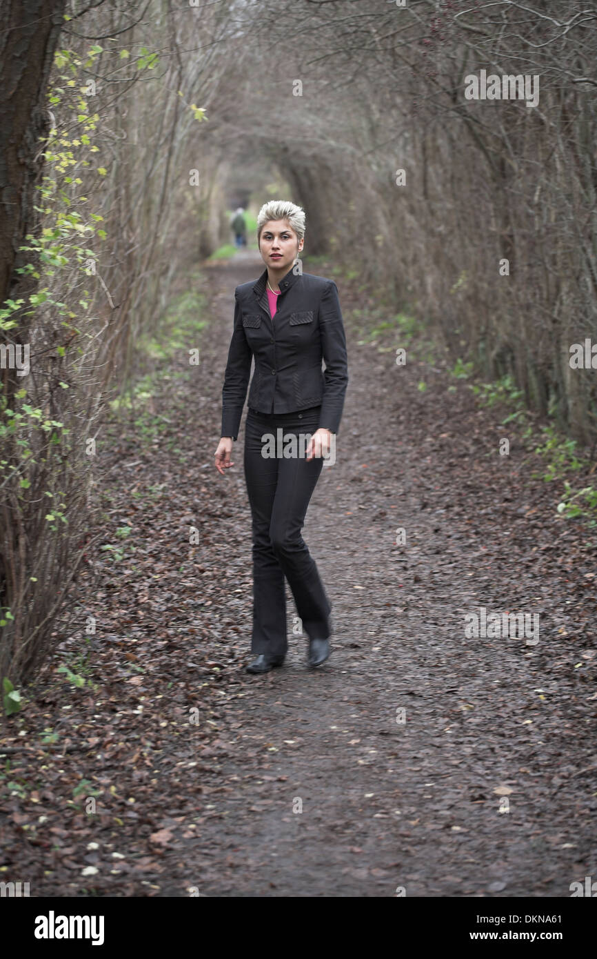 pretty business woman outdoor on a path in the nature Stock Photo - Alamy
