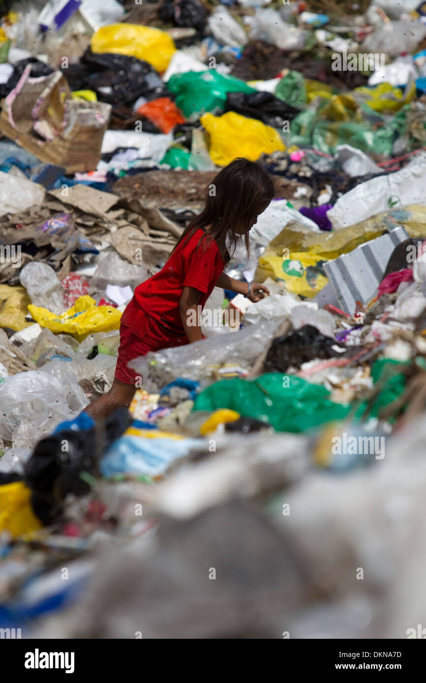 A child scavenging for anything of value within the Inayawan Landfill ...