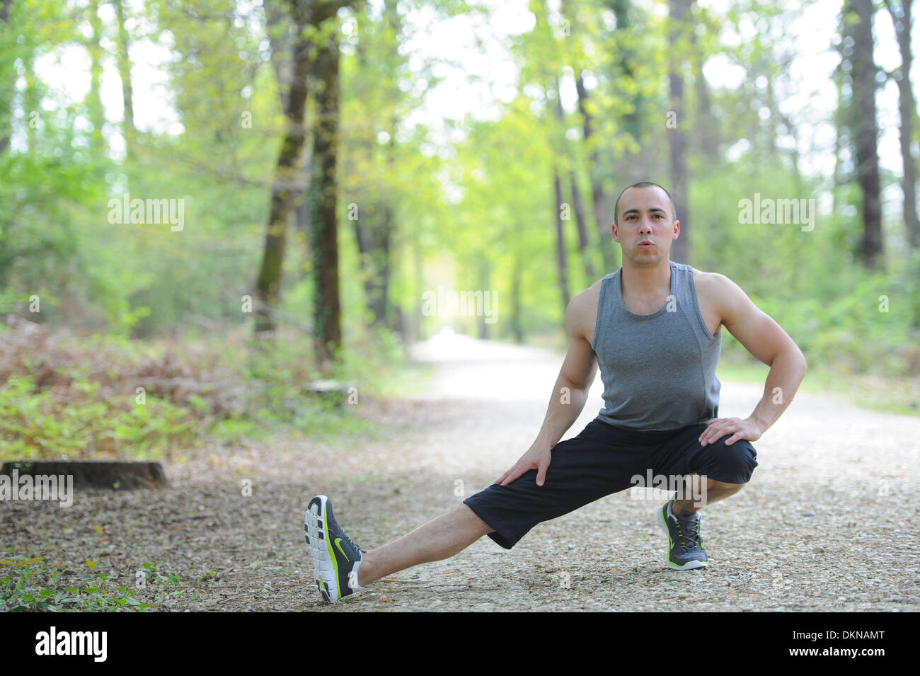 Stretching-Man-Sports and Fitness Stock Photo - Alamy