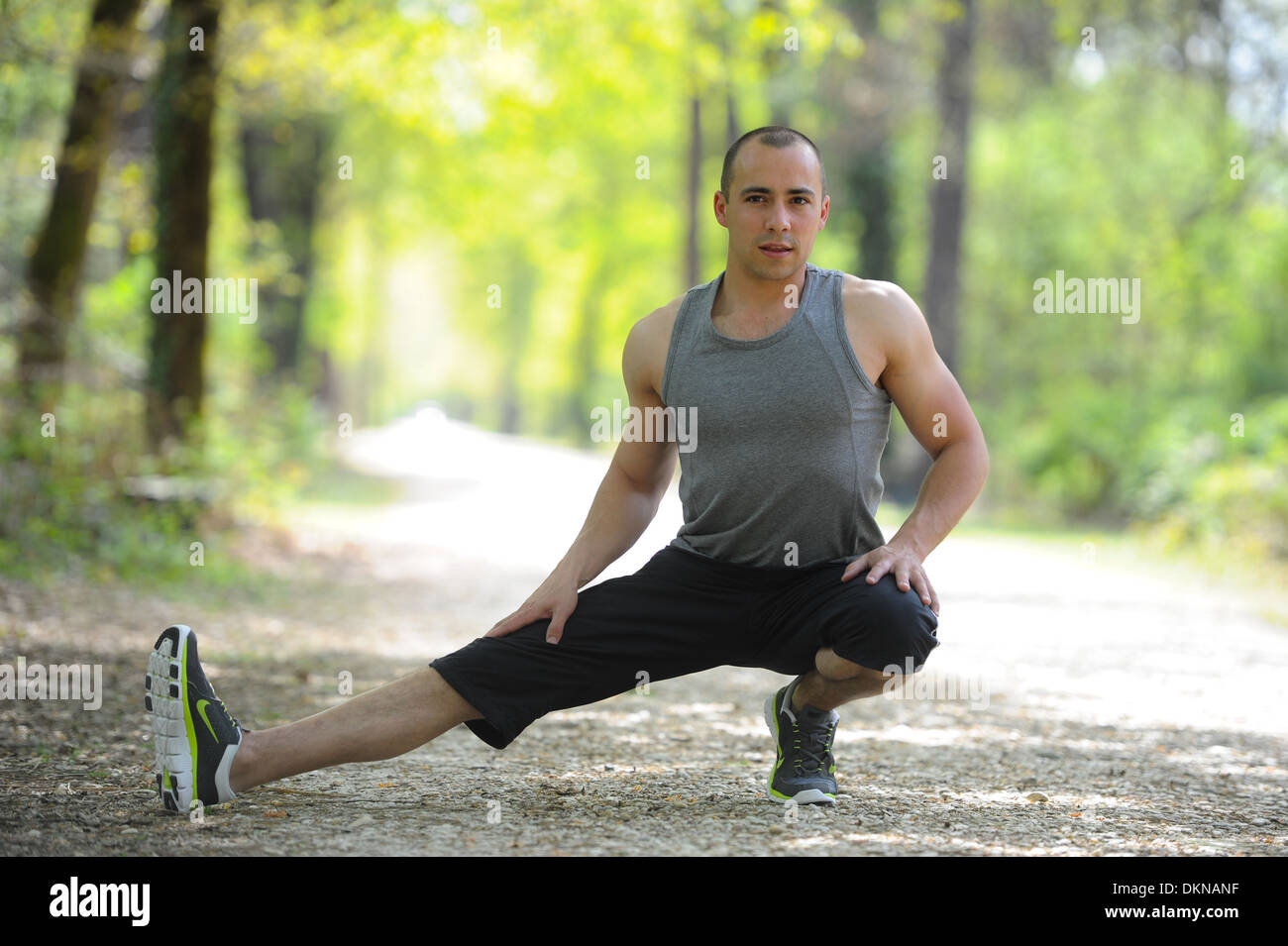 Stretching-Man-Sports and Fitness Stock Photo - Alamy