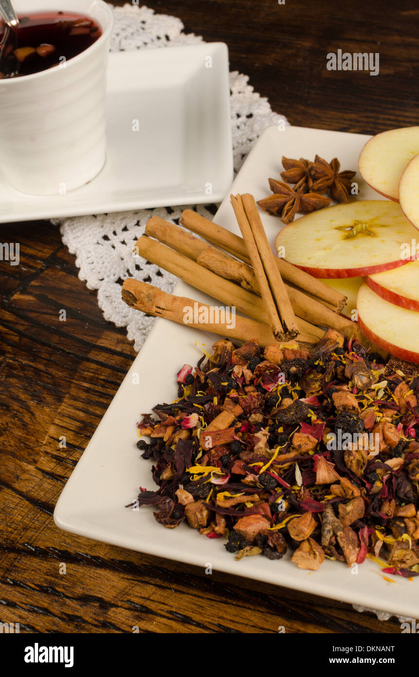 Aromatic fruit tea in a still life with its ingredients Stock Photo - Alamy