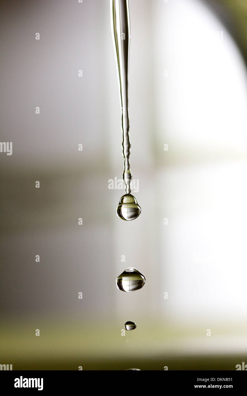 The fluid motion of water splashing as it is poured Stock Photo - Alamy