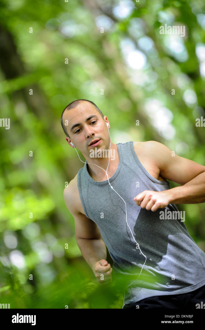 Man running in forest hi-res stock photography and images - Alamy