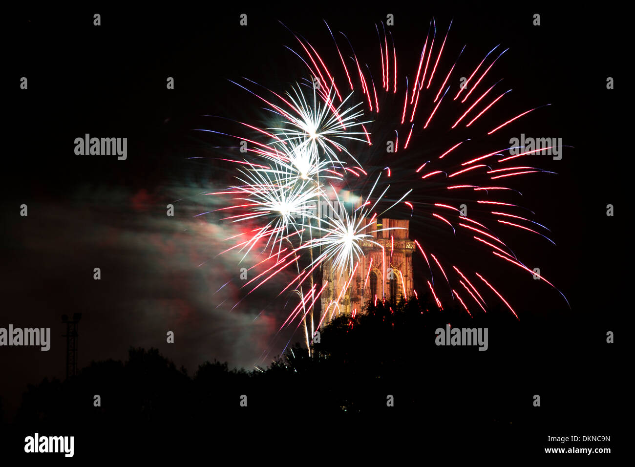 Exploding fireworks rockets with red and white clouds Stock Photo - Alamy