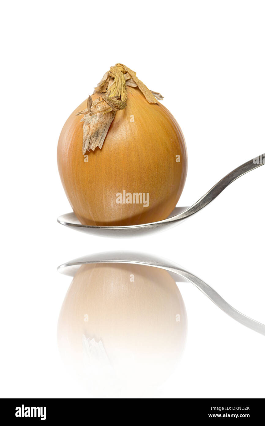 reflected unpeeled onion on a spoon, isolated on white Stock Photo - Alamy