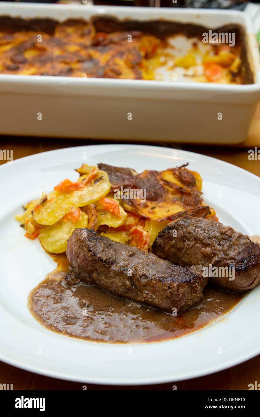 Venison fillet with potato gratin Stock Photo - Alamy