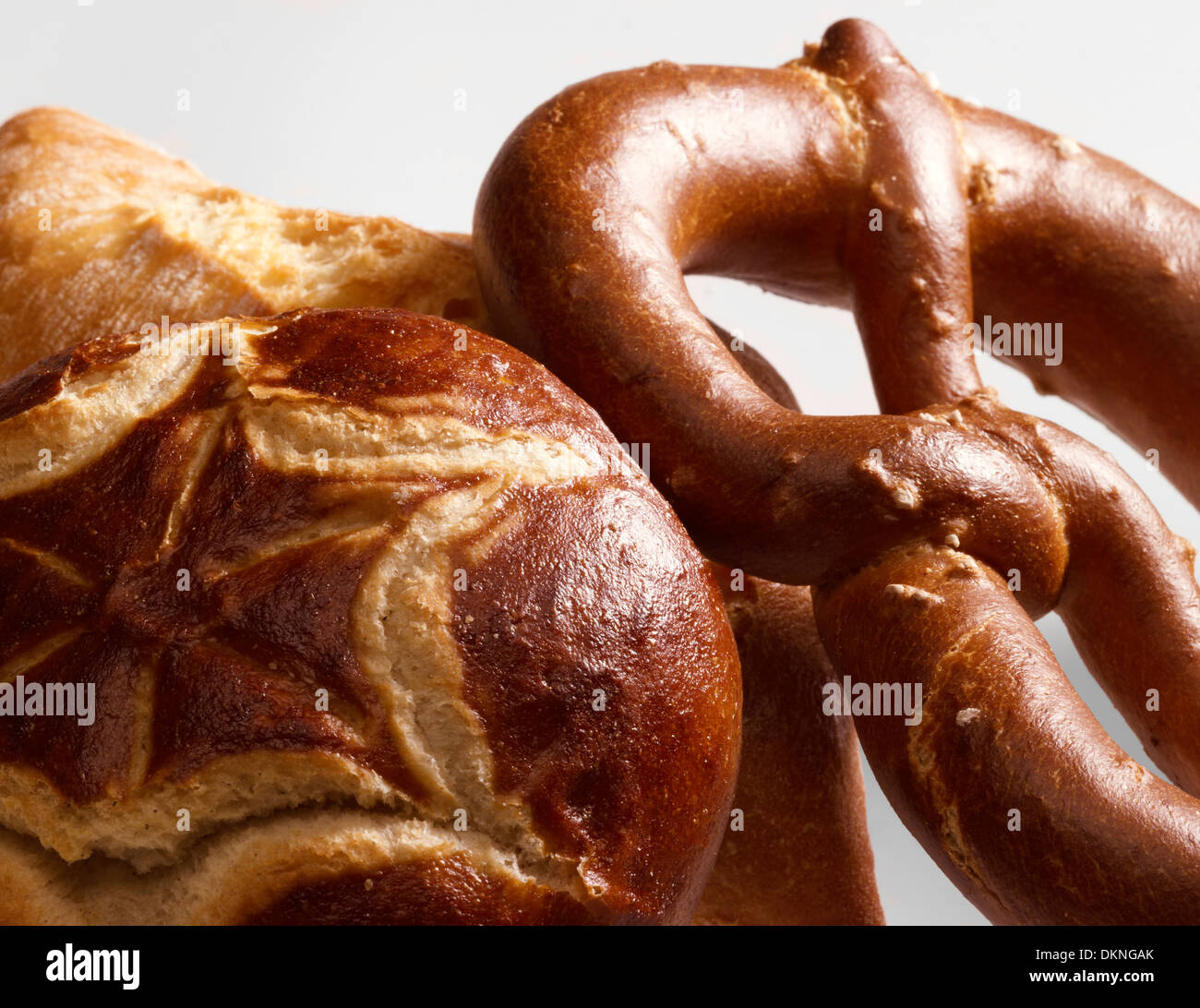 detail of some german lye rolls and bread roll in light back Stock ...