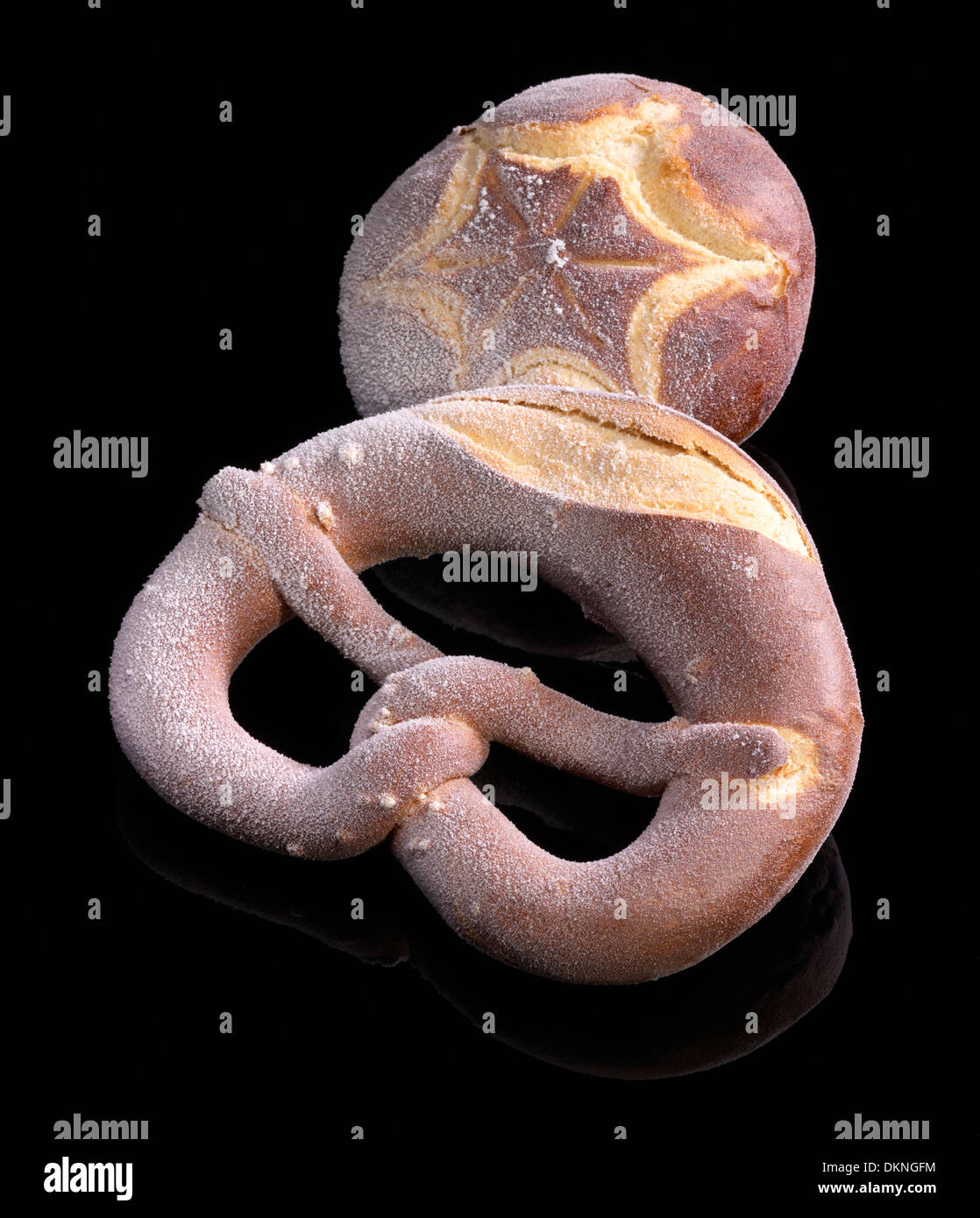 frozen german lye rolls in black reflective back Stock Photo - Alamy