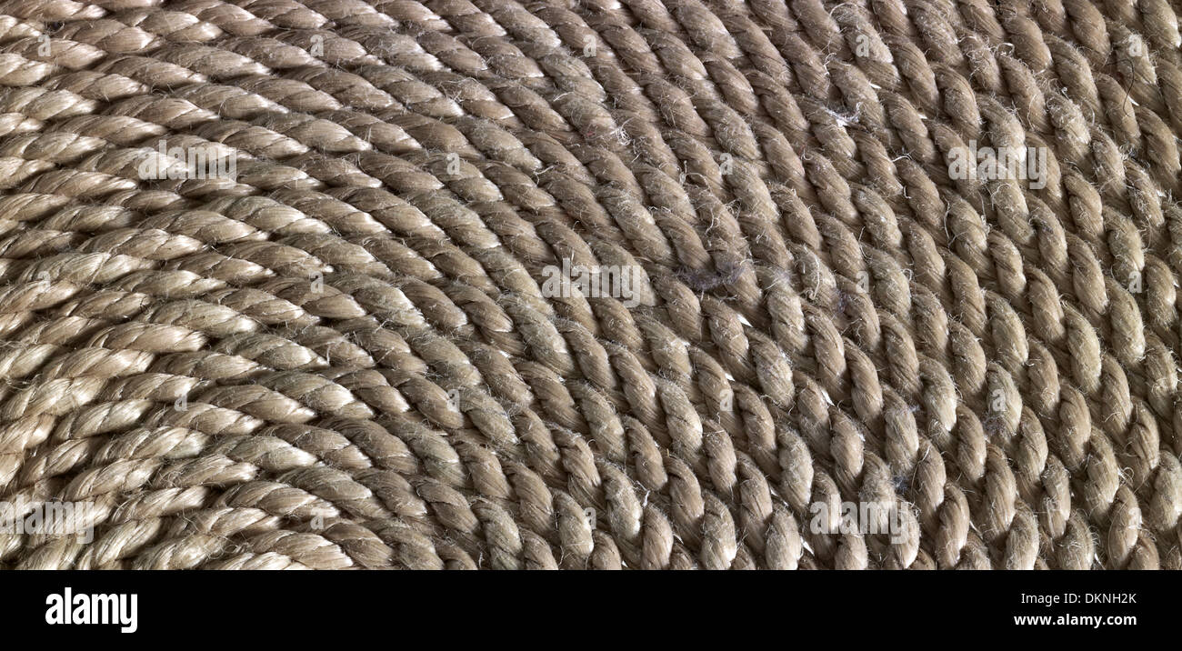 full frame detail of a light brown rolled rope Stock Photo - Alamy