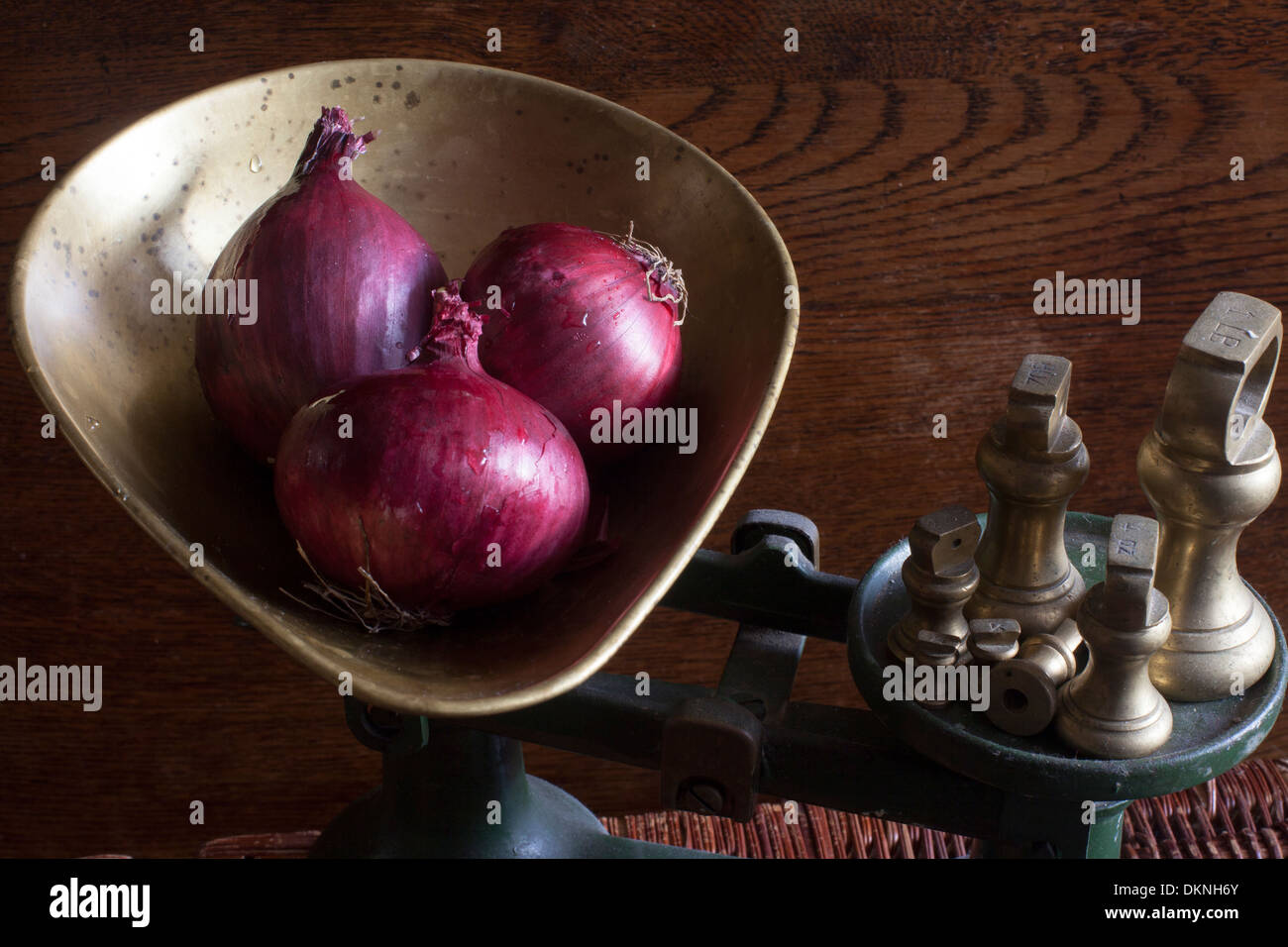 red onions in a set of scales Stock Photo - Alamy