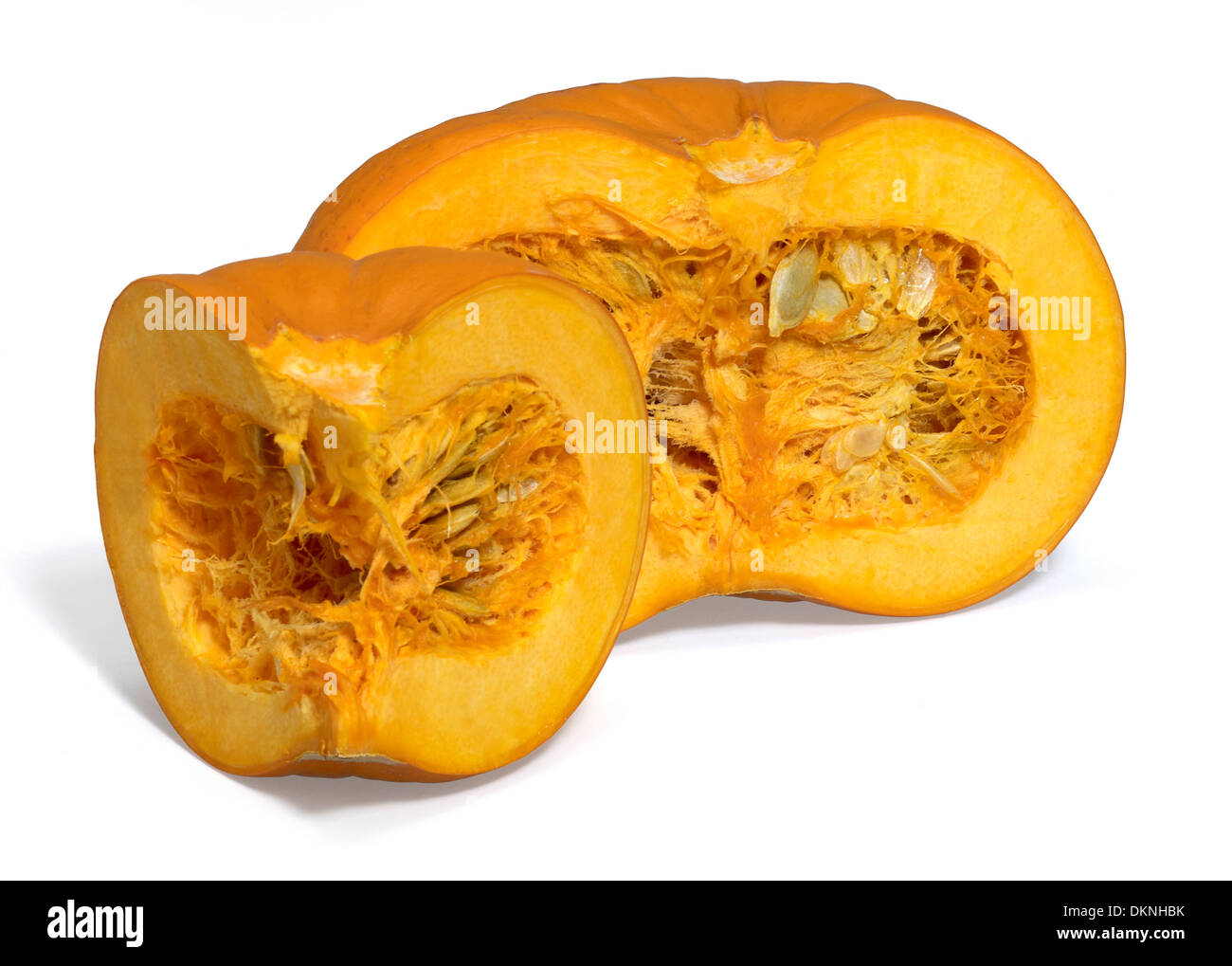 open orange punpkin in light back Stock Photo - Alamy