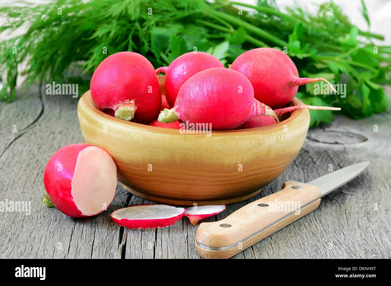 Garden red radish on wooden table hi-res stock photography and images ...