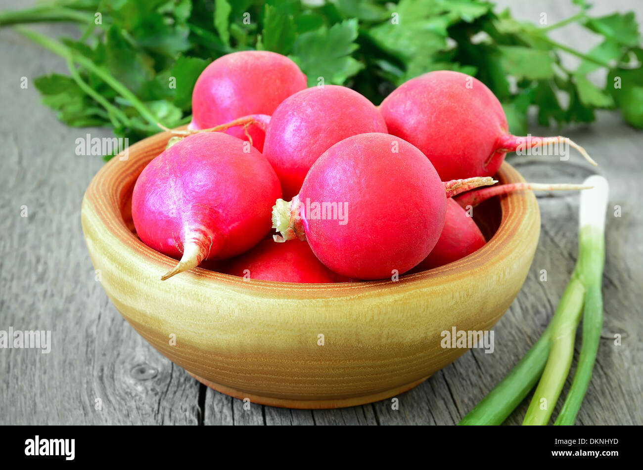 Garden red radish on wooden table hi-res stock photography and images ...