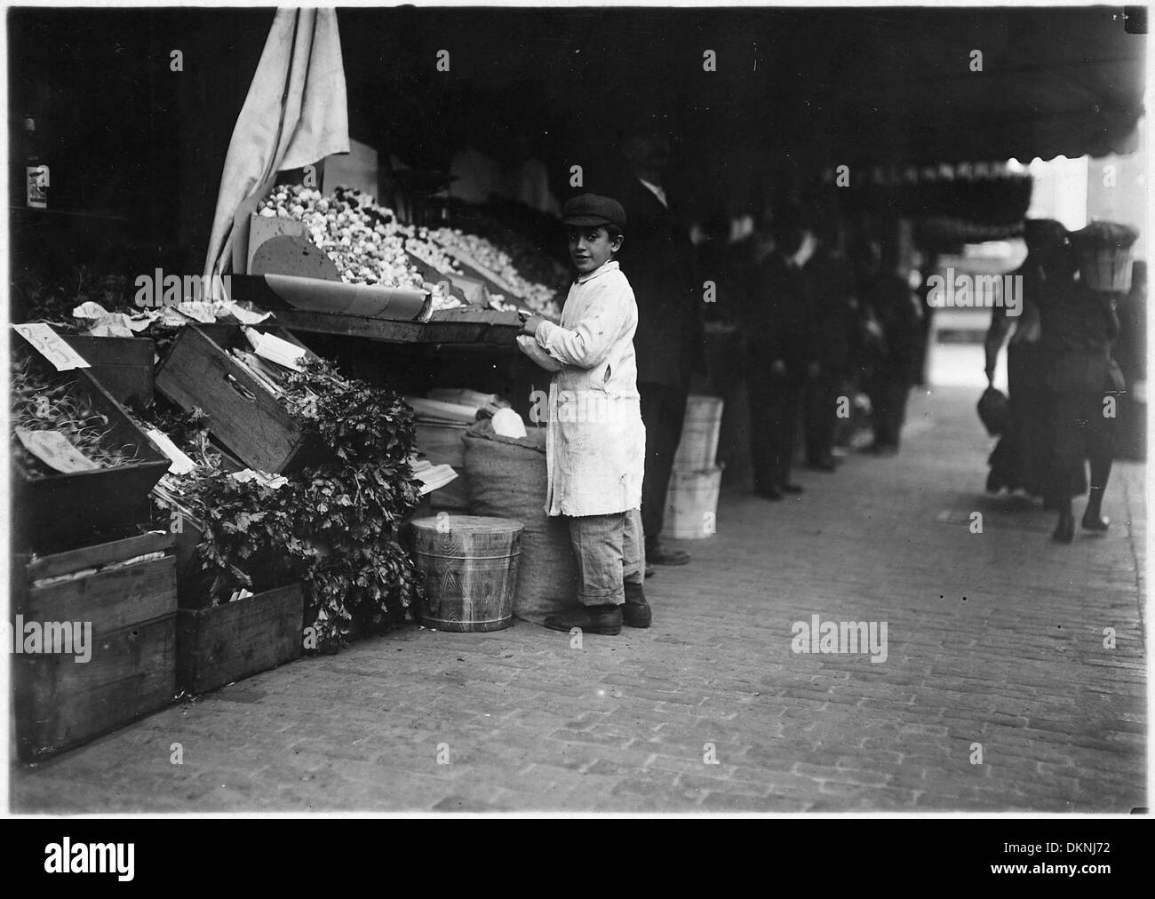 A candy seller is pictured in Boston, Massachusetts, dressed in attire ...