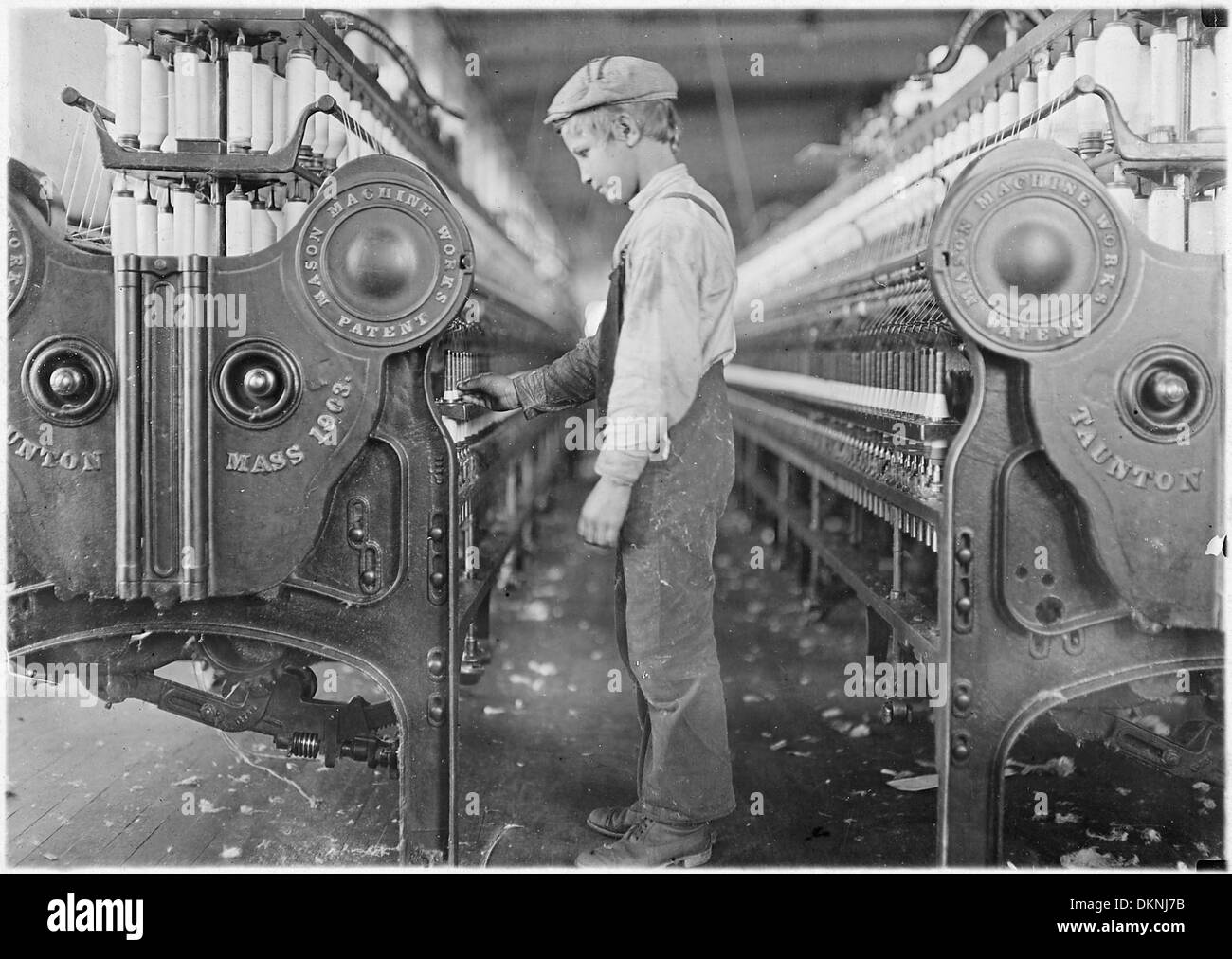 A doffer works at Lincolnton Mill in Lincolnton, North Carolina ...