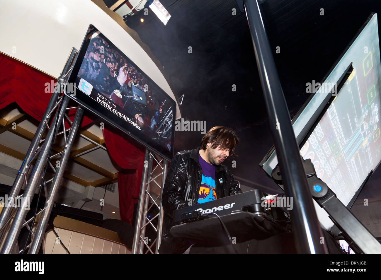 DJ Alvaro Reina next to the mixer to begin the party of the hot mix ...