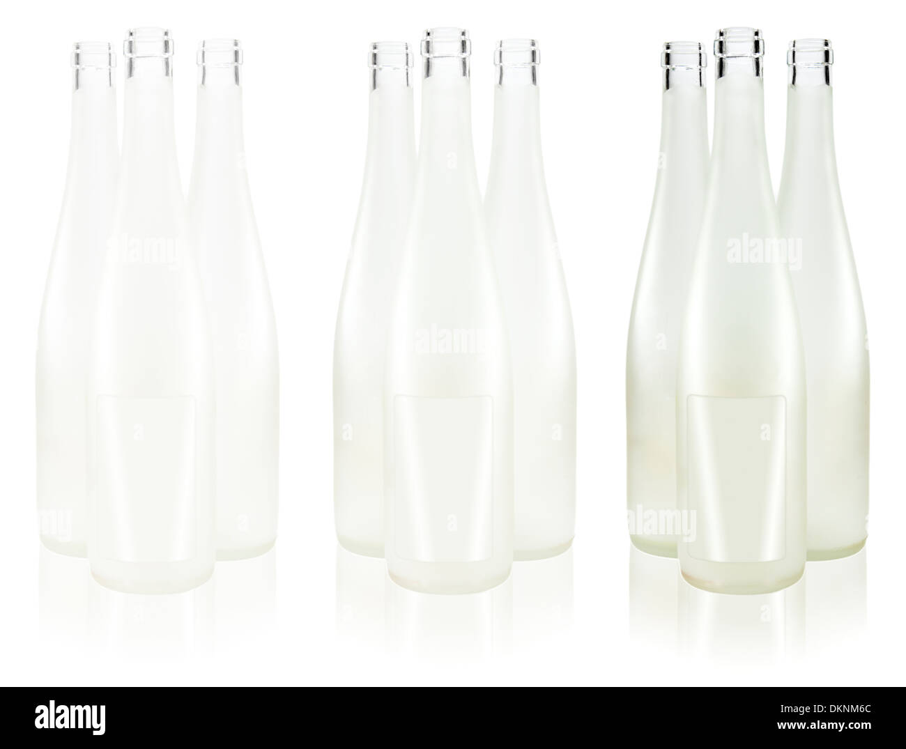 Three sets of isolated white wine bottles in different tone Stock Photo ...