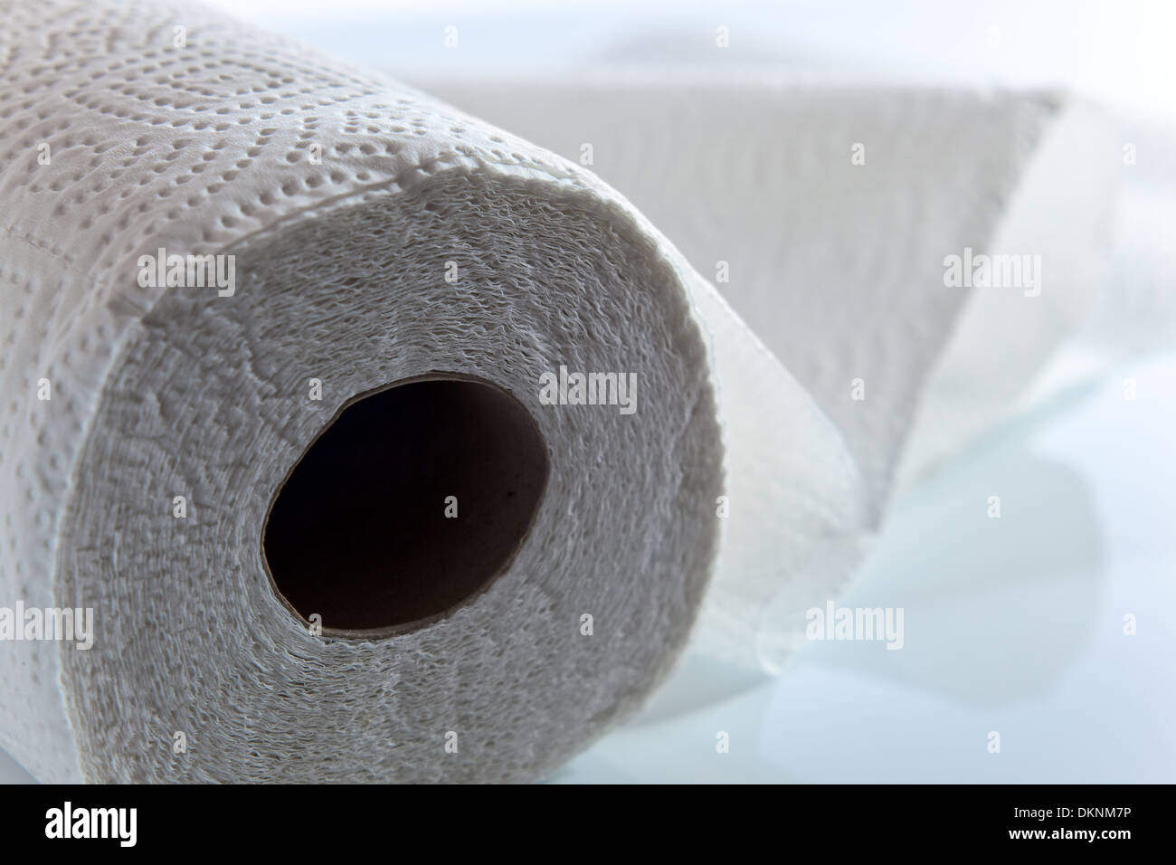 white paper towel on white reflective background Stock Photo - Alamy