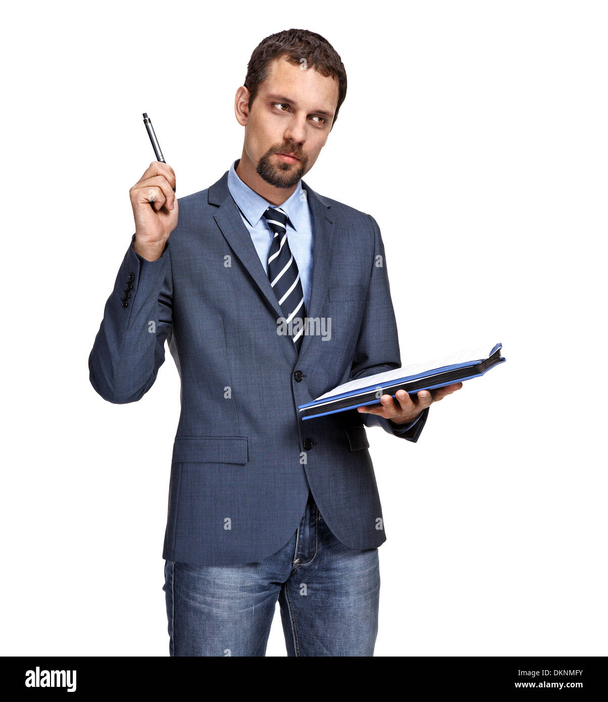 Young business man thinking while writing notes isolated over white ...
