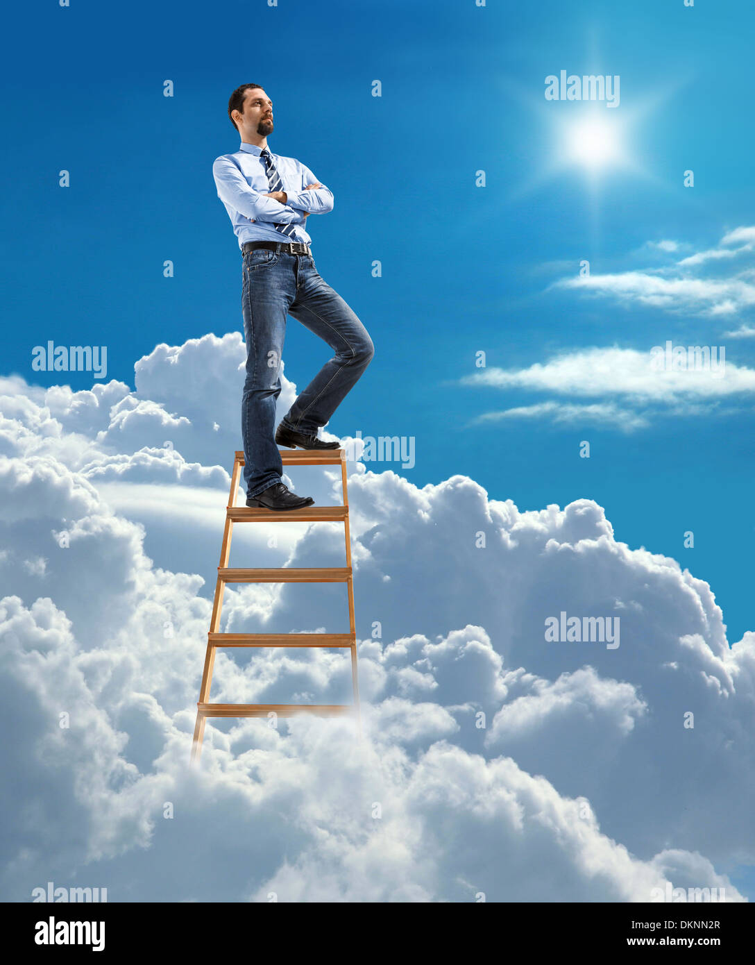 Man at top of ladder hi-res stock photography and images - Alamy