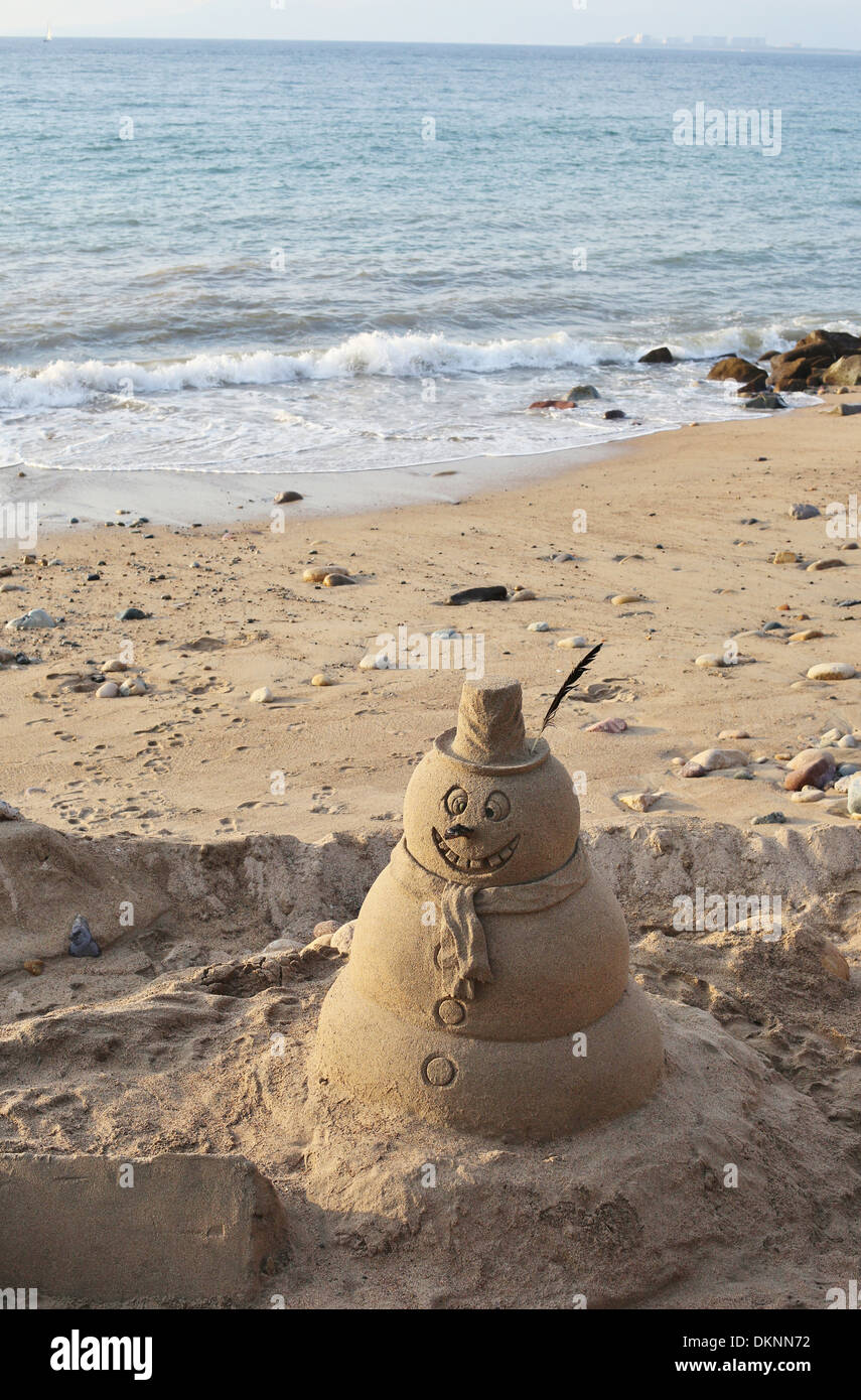 Snowman made sand on beach hi-res stock photography and images - Alamy