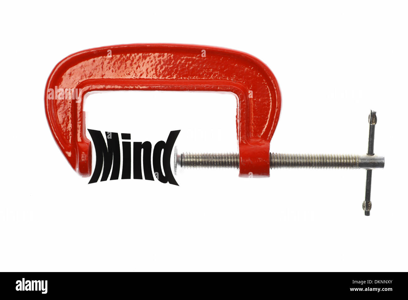 The word "Mind" is compressed with a vice Stock Photo - Alamy