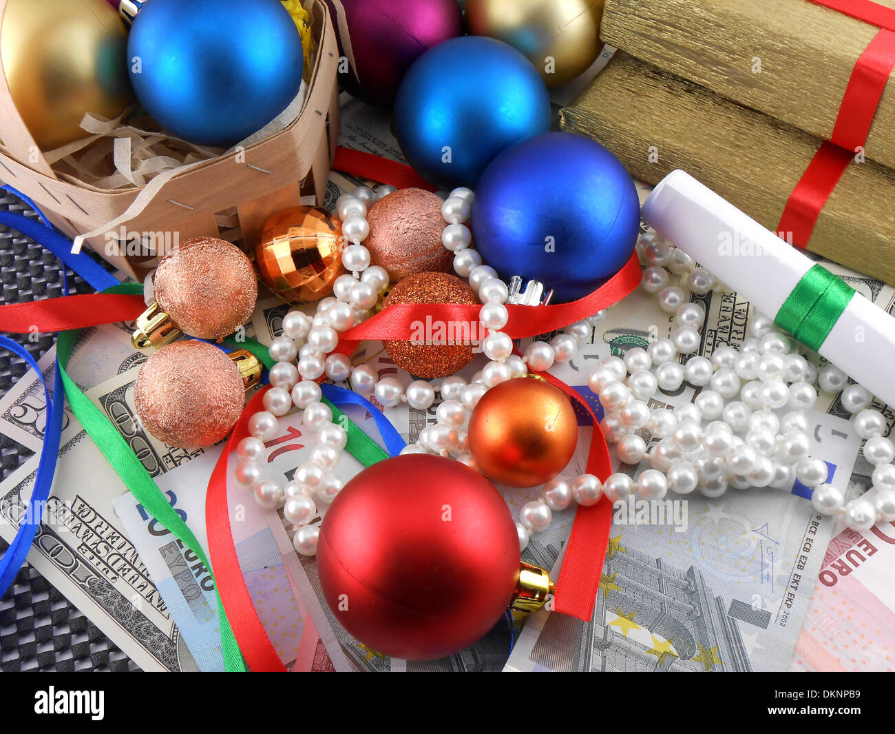 Christmas gift box, christmas balls, money and diamonds Stock Photo - Alamy