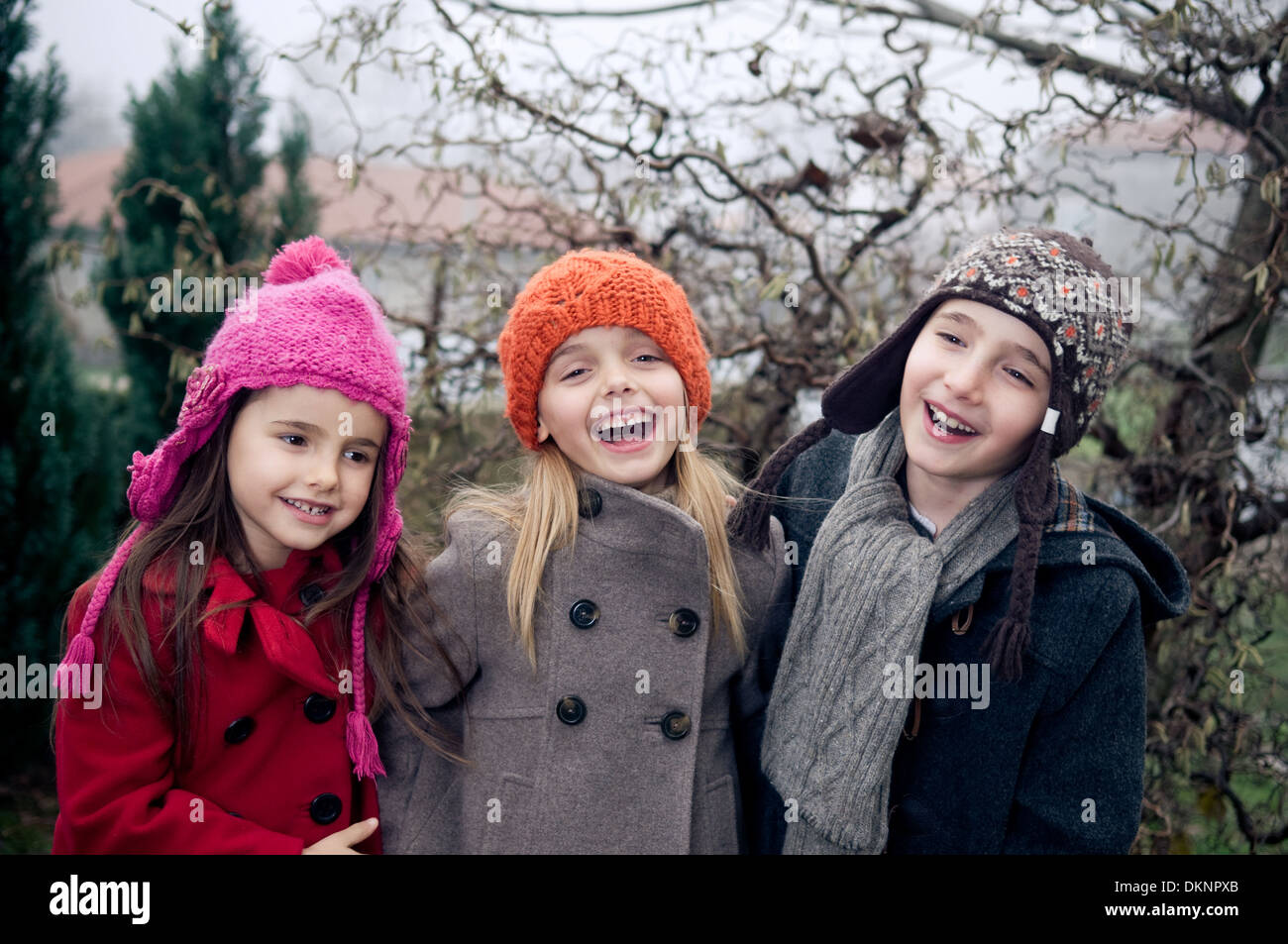 Happy kids outside in cold weather Stock Photo - Alamy