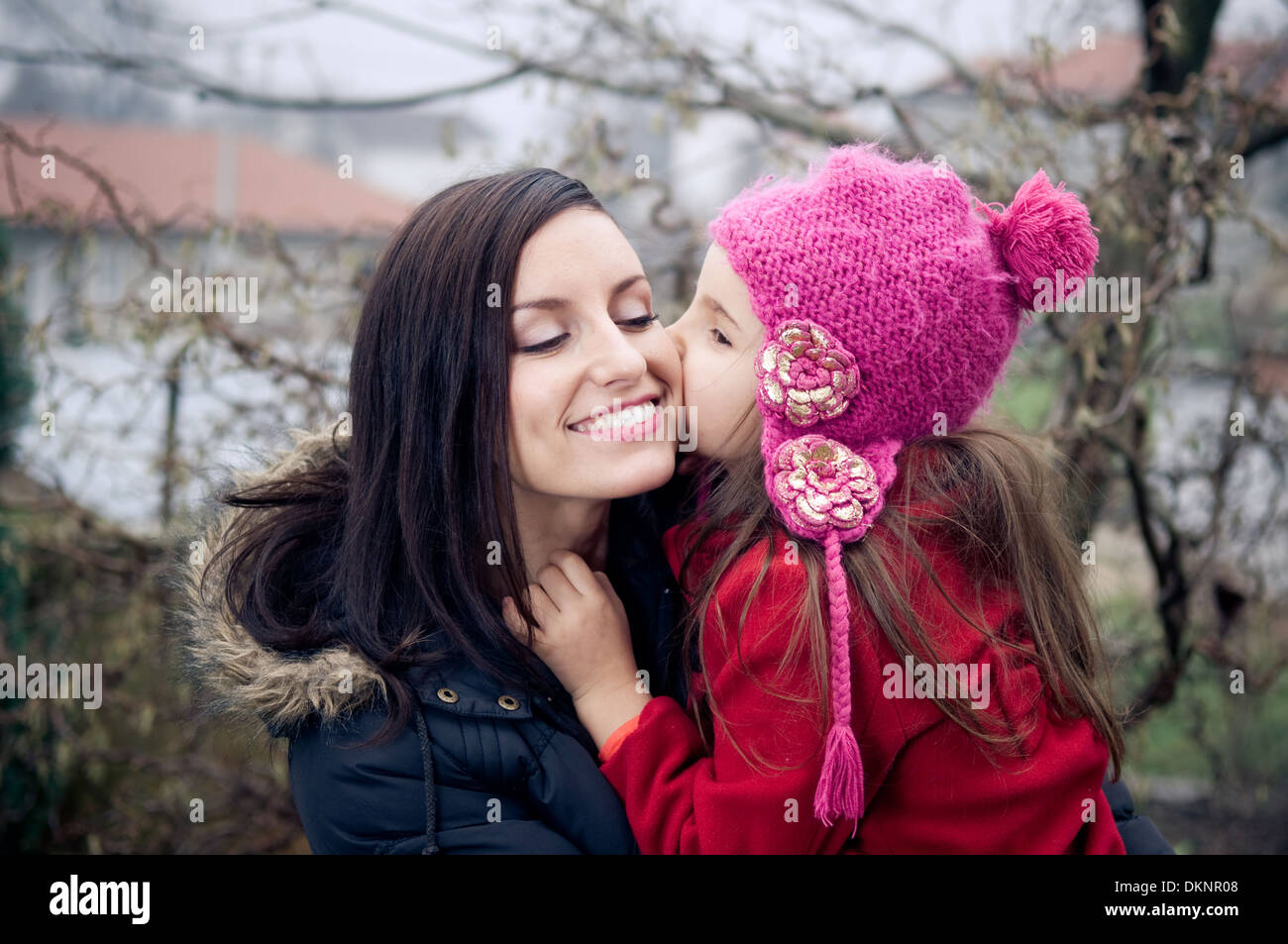 Mother and daughter outside in cold weather Stock Photo - Alamy