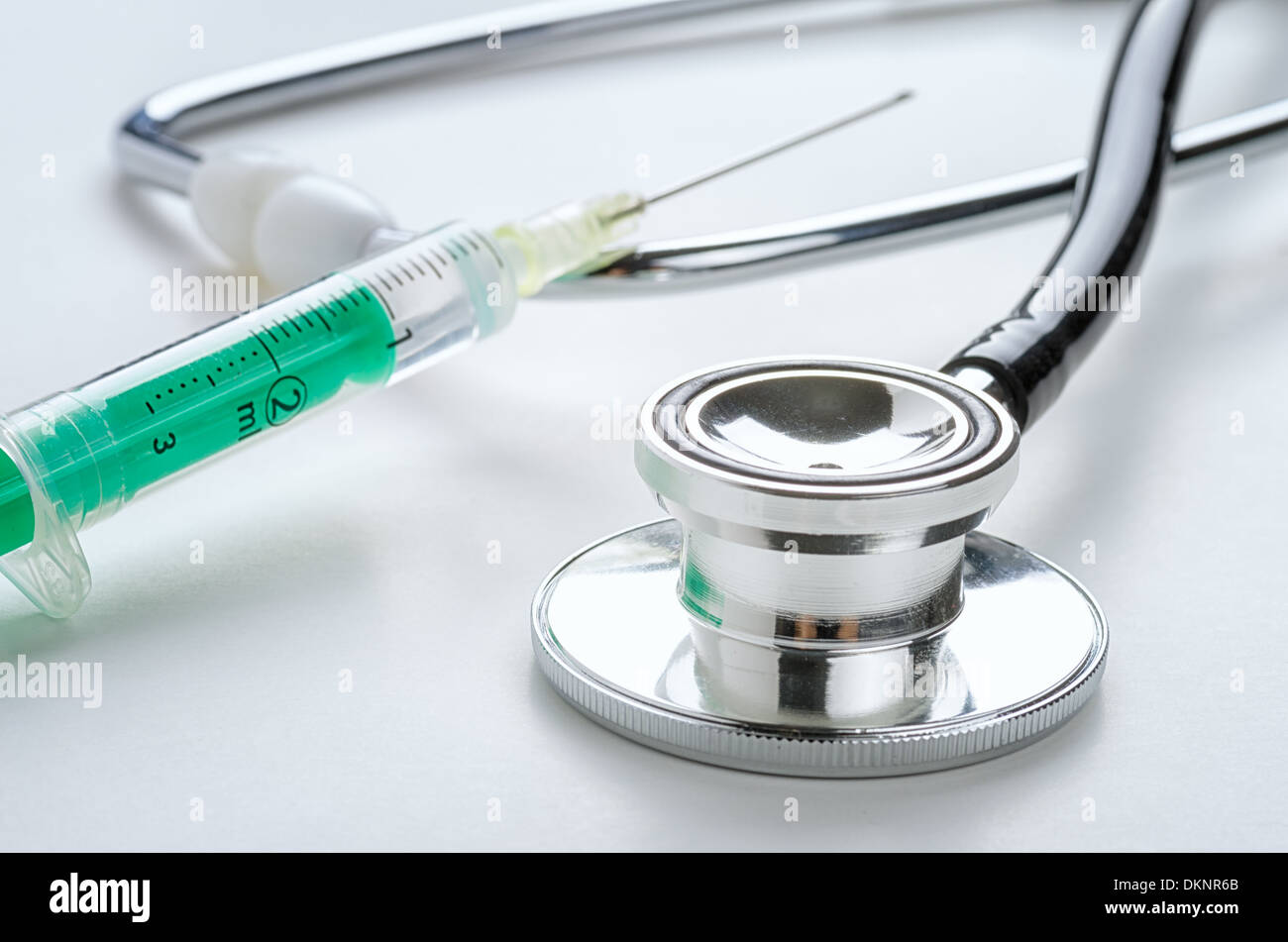 Stethoscope with syringe Stock Photo - Alamy