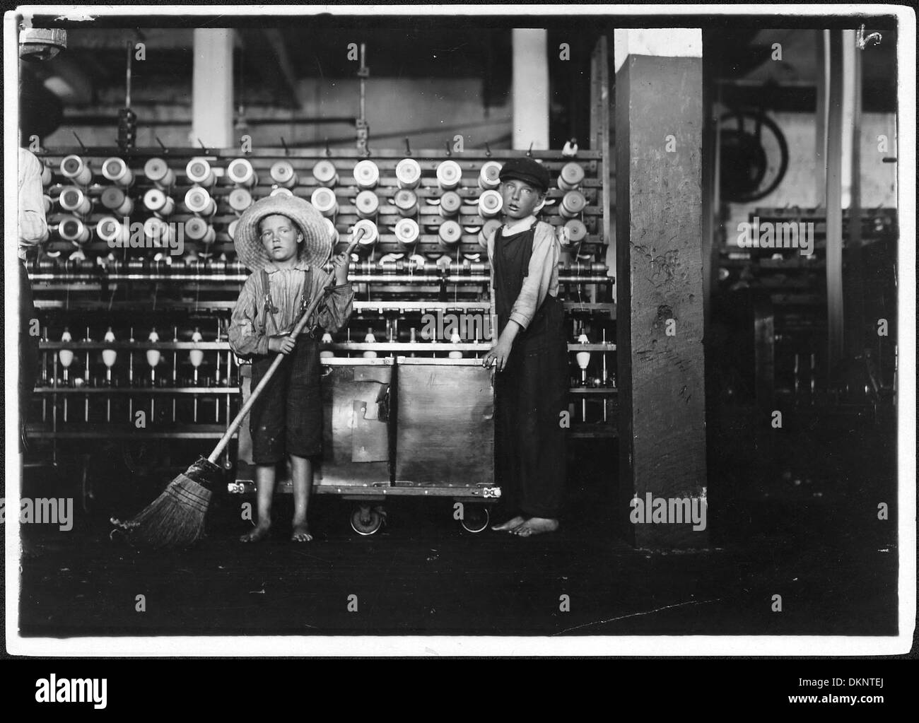 This image shows 12-year-old Ronald Webb, a doffer boy, alongside 7 ...