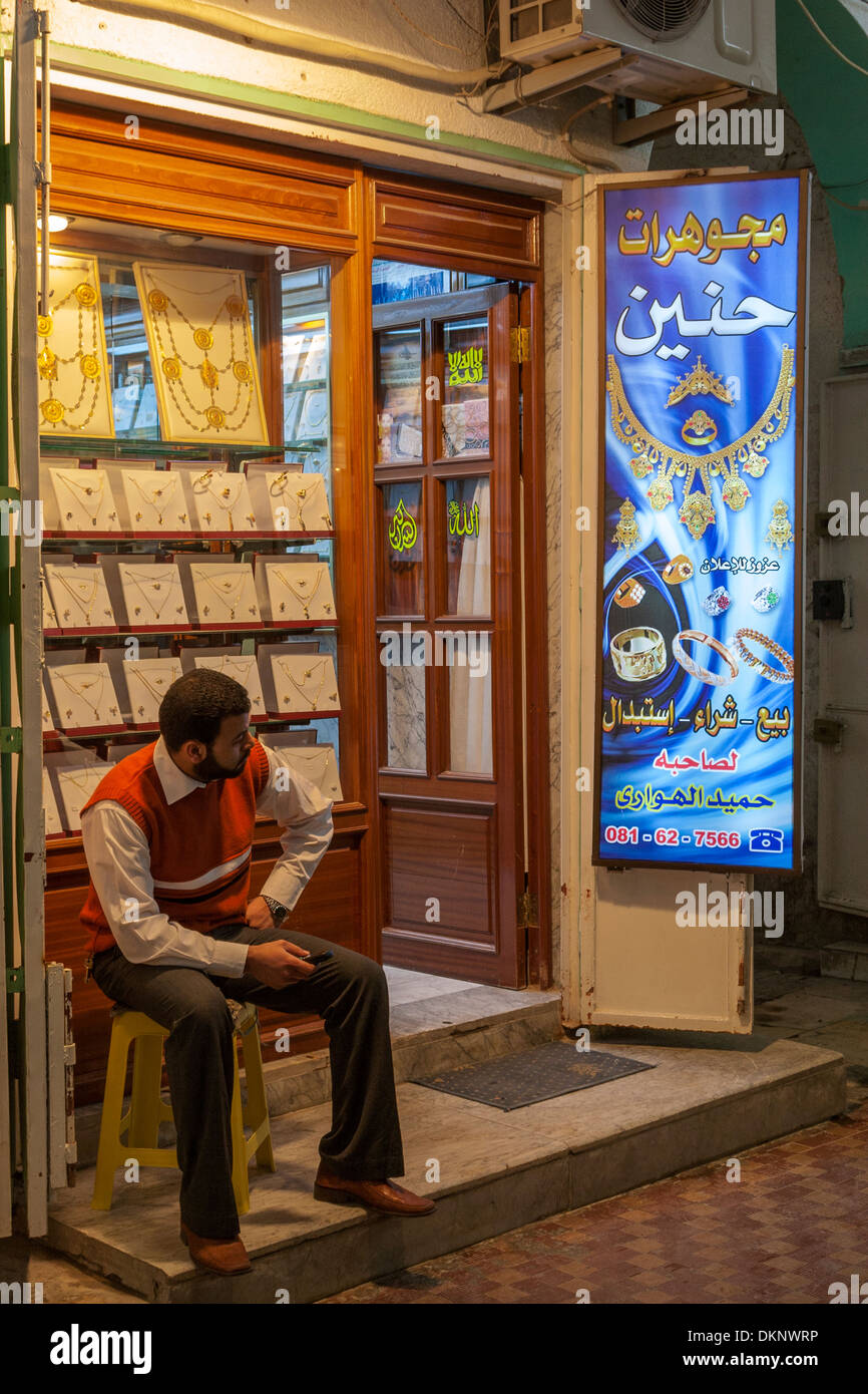 Libya, Derna. Waiting for a Customer, a Jeweler Sits by the Door of his ...