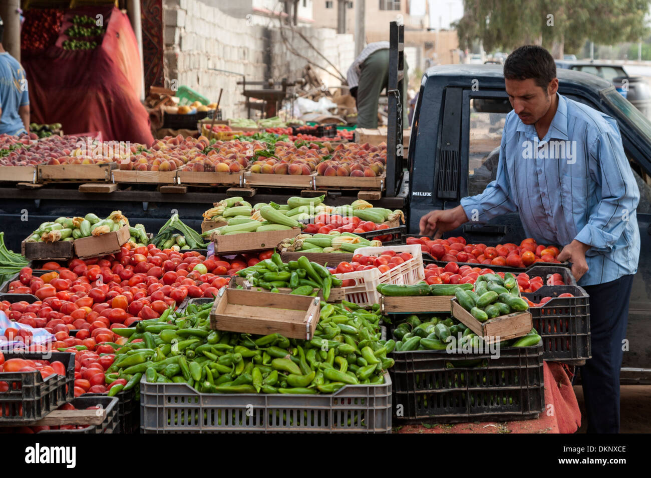 Libya, Tripoli. Unloading Baskets of Vegetables at a Roadside Fruit and ...