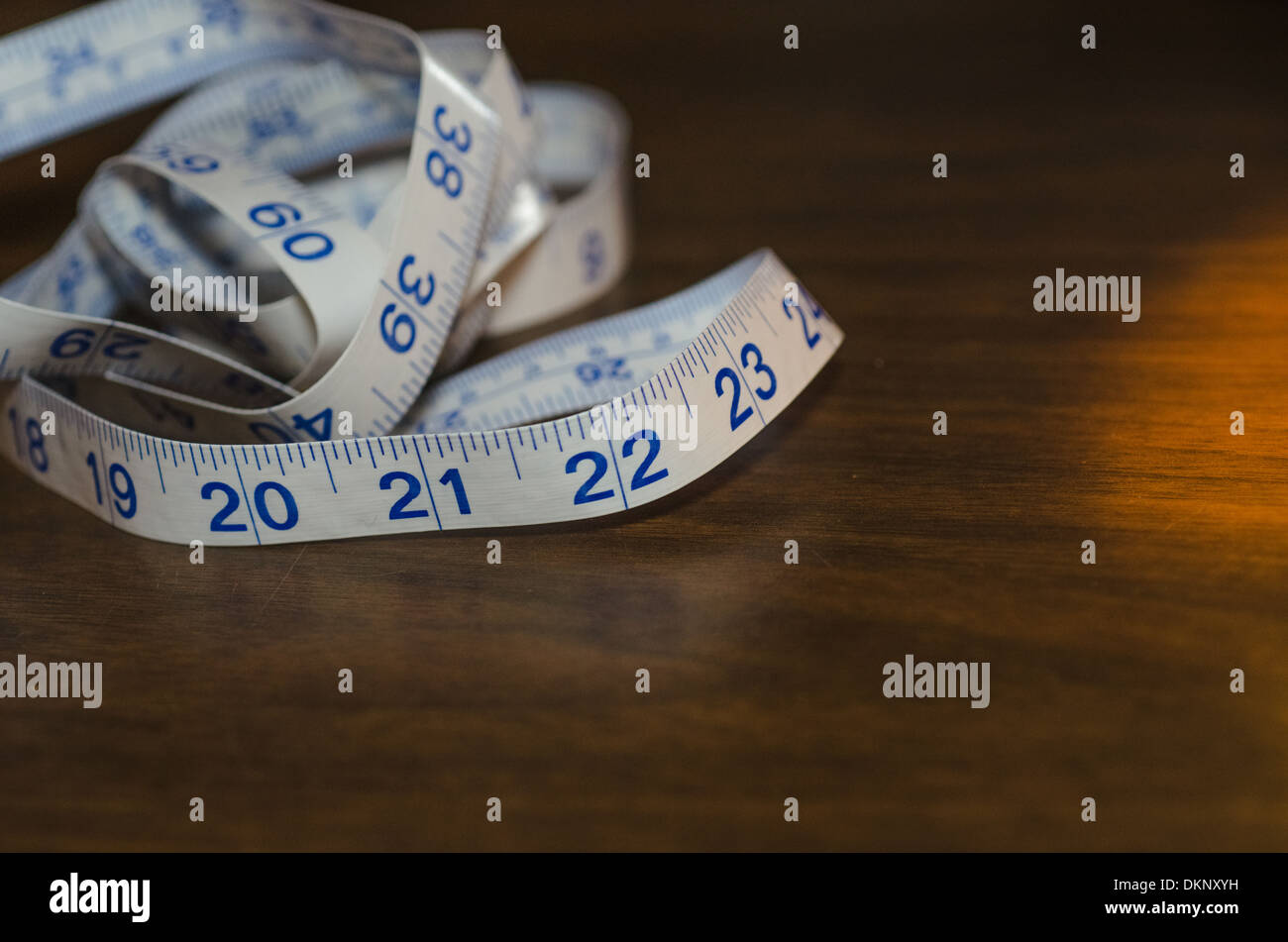 Measuring tape and sewing Stock Photo - Alamy