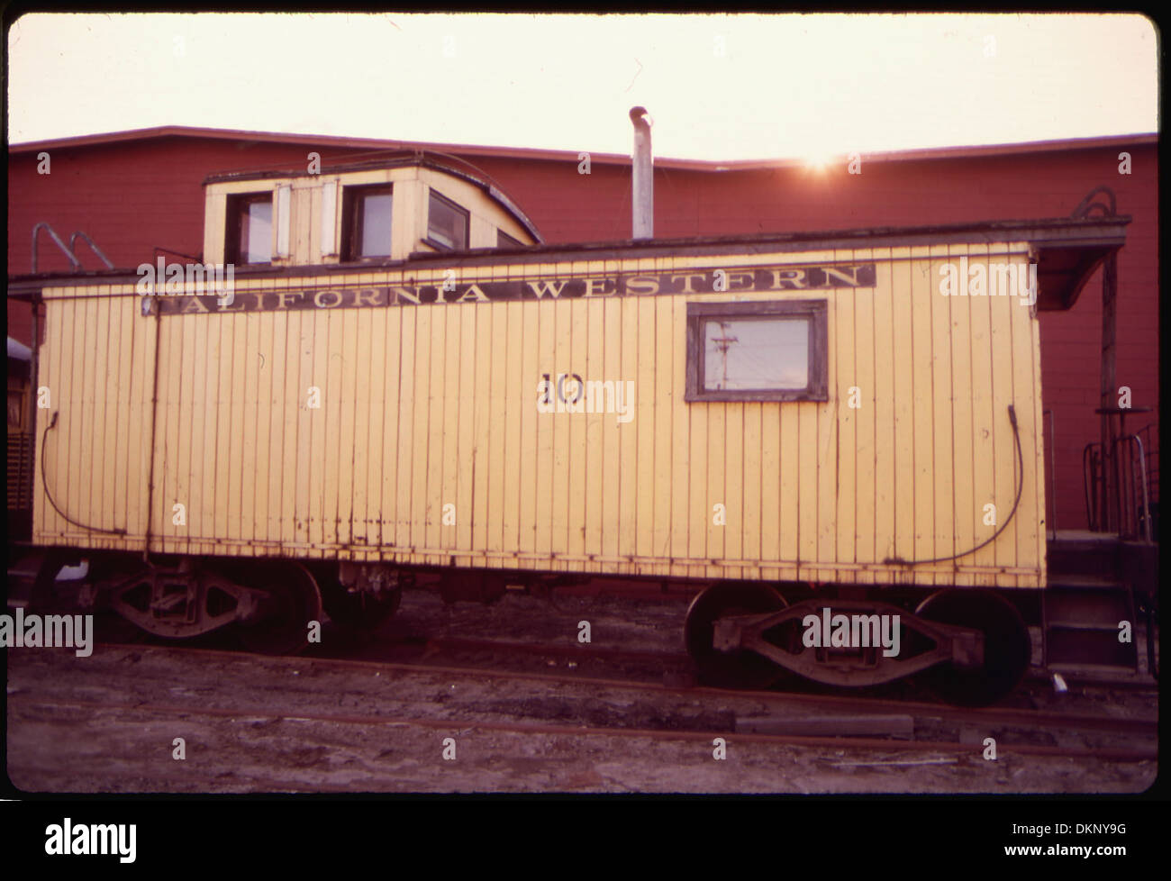 A yellow caboose on the California Western Railroad, an iconic symbol ...