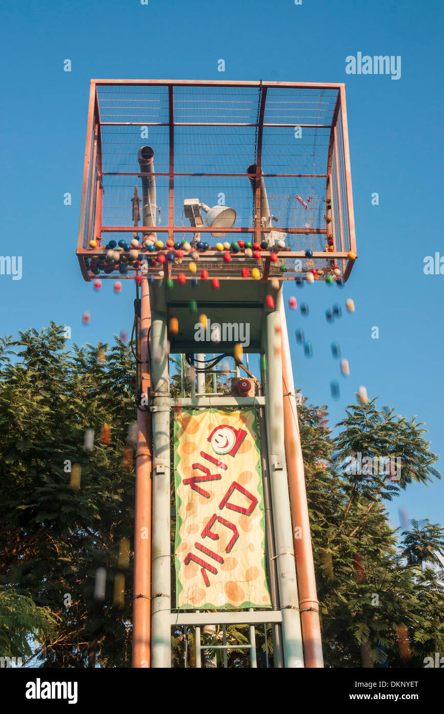 A sponge-ball throwing device in an amusement park Stock Photo - Alamy