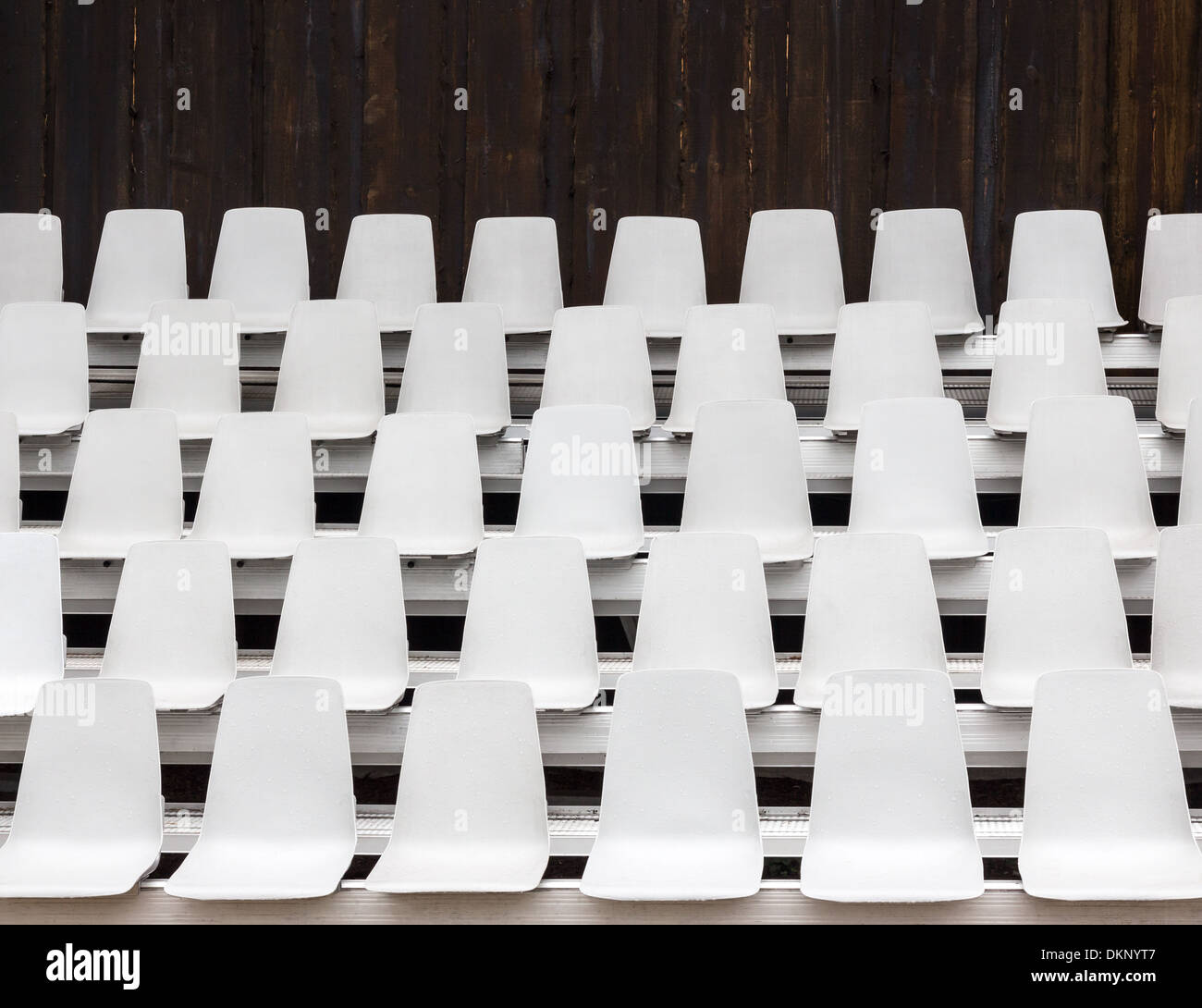 White empty seats in an outdoor venue Stock Photo - Alamy