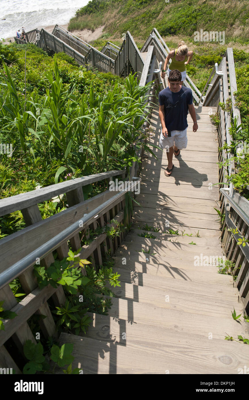 Walking down the famous hundred steps that climb Mohegan Bluffs, a ...