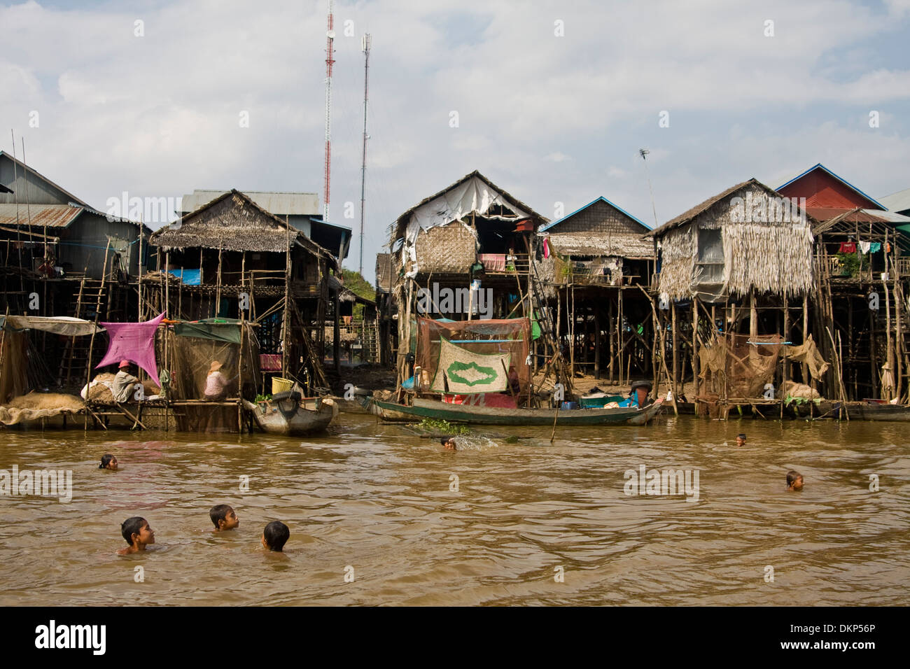 Children bathing in Kampong Phluk, Floating Village in Cambodia Stock ...