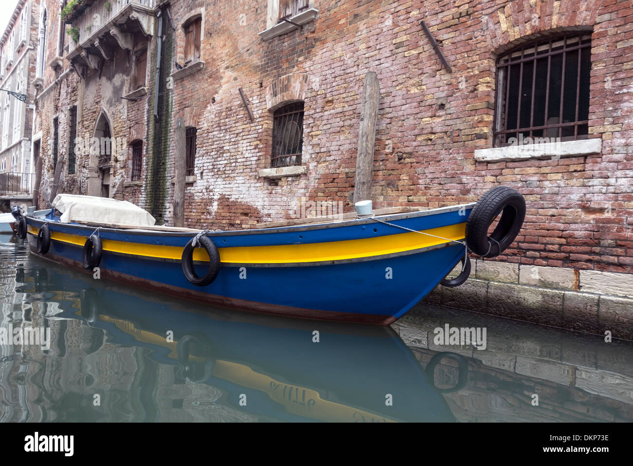 Old gondola boat in a quiet small Canal ,Venice, Italy Stock Photo - Alamy